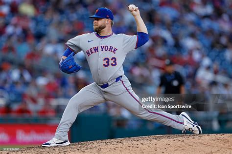 New York Mets Pitcher A J Minter Delivers A Pitch During An Mlb Game