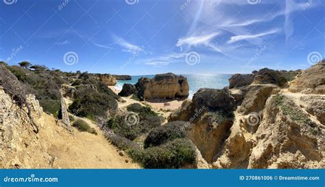 Walking Along The Cliffs And Beach Of Praia Da Coelha And Praia Do