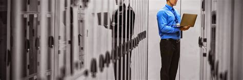Technician Using Laptop While Analyzing Server Stock Image Image Of