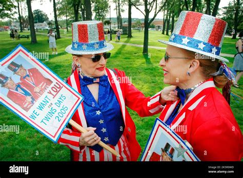 Twin Sisters Who Look Alike And Act Alike As Twins At The Annual Twins