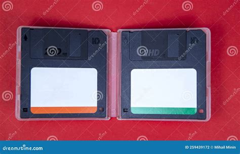 Obsolete Computer Floppy Disks On A Colored Background Isolated Stock Photo Image Of