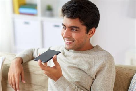 Premium Photo Technology Communication And People Concept Happy Smiling Man Using Voice