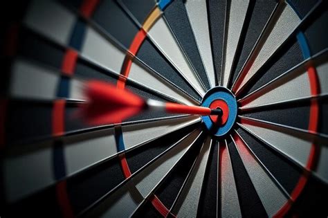 Premium AI Image A Red Arrow Pointing To The Right Of A Dart Board