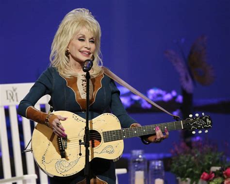Dolly Parton Playing Guitar