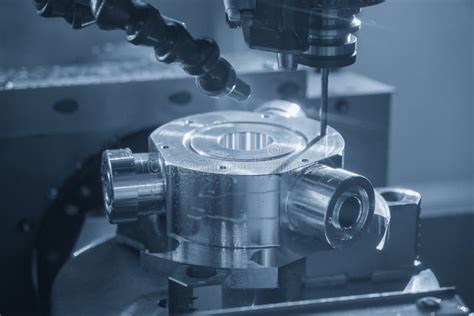 The Axis CNC Milling Machine Hole Cutting On The Metal Part Stock Image Image Of Process