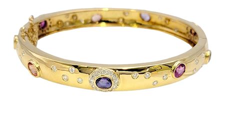 562 Carat Total Multi Colored Sapphire And Diamond Yellow Gold Bangle
