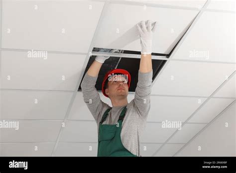Suspended Ceiling Installation Builder Working With Pvc Tile Stock