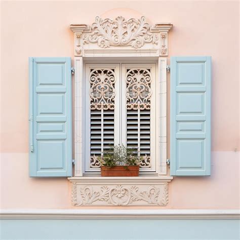 Premium Photo Wooden Window Shutters On A Background Of A Wall