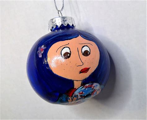 Coraline Holding A Snow Globe Etsy