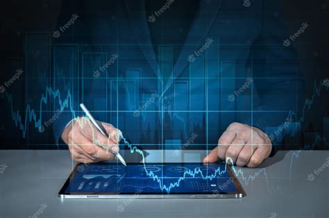 premium photo business growth businessman using tablet analyzing sales data and economic