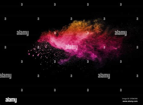 Red Yellow Powder Explosion Cloud On Black Background Freeze Motion Of
