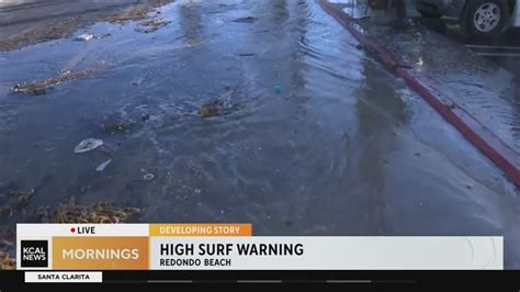 Redondo Beach Sees Huge Waves As Rain High Surf Cause Flooding In