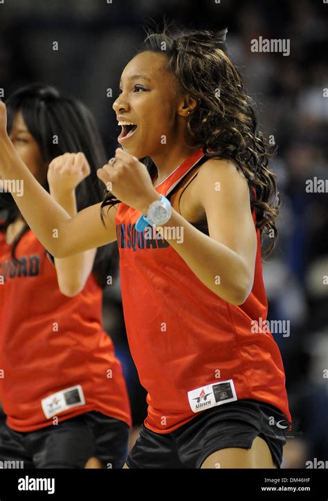 Gonzaga Cheerleader Cheers On The Mens Basketball Team During A Ncaa