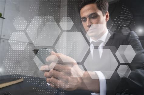 premium photo man in office working with smartphone searching for new
