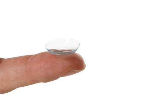 Pngcloseup Of A Clear Contact Lens On A Fingertip Isolated On White