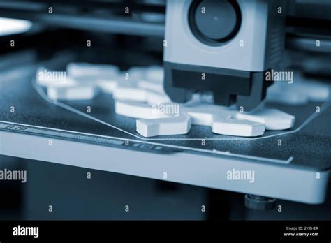 Process Of Printing On 3d Printer 3d Printer Creating Model From Molten Plastic Close Up