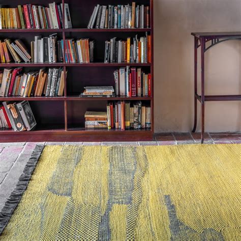 Eight Home Interiors Furnished Around Statement Rugs