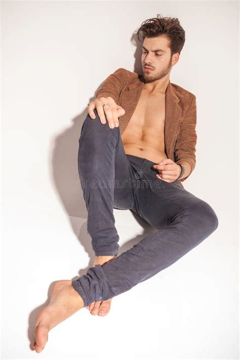 Casual Man Fashion Pose Lying Down Photos Free And Royalty Free Stock