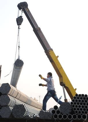 3 Workers Load Steel Pipes Stock Pictures Editorial Images And Stock Photos Shutterstock