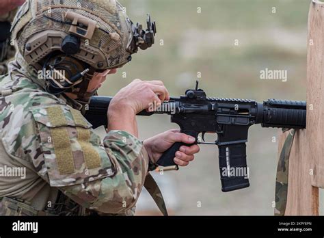 A Us Air Force Tactical Air Control Party Tacp Specialist Fires His