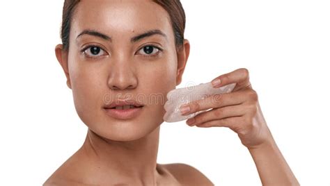 Youll See Results In Less Than A Week A Beautiful Woman Using A Gua Sha Tool On Her Face Stock