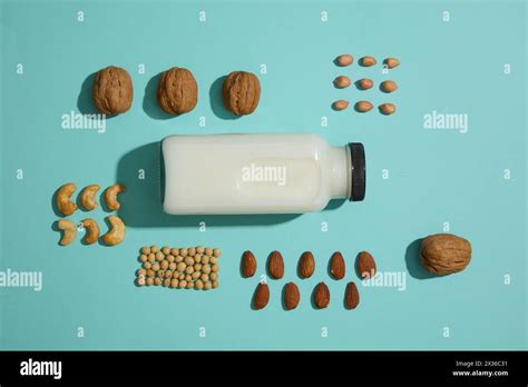 Empty Label Milk Bottle Surrounded By Some Handfuls Of Different Types