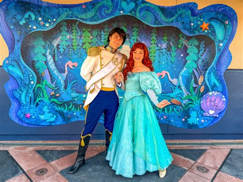 Princess Ariel And Prince Eric Are Meeting And Greeting In Disneys