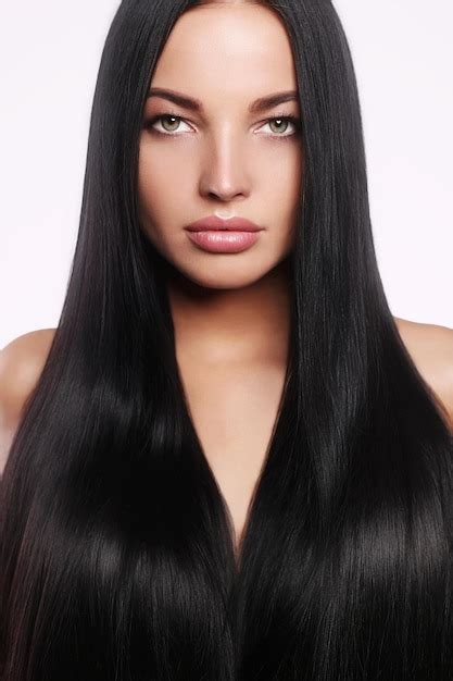 Beautiful Young Woman With Long Hair And Makeup Premium Photo