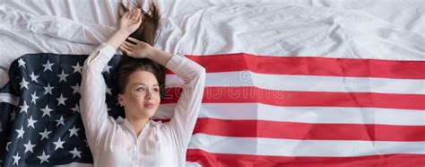 Usa Independence Day Girl In The Bedroom Lies On The American Flag