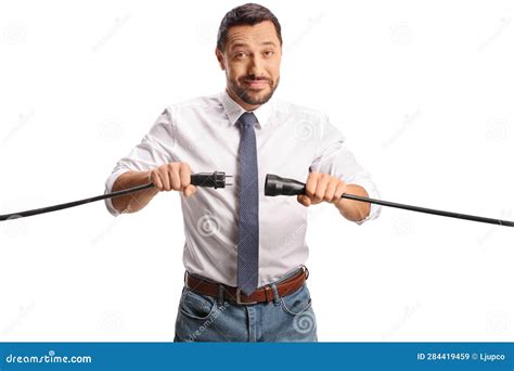 Man Unplugging Cables And Looking At Camera Stock Image Image Of