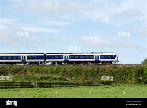 Chiltern Railways Class 165 Diesel Train Side View On An Embankment