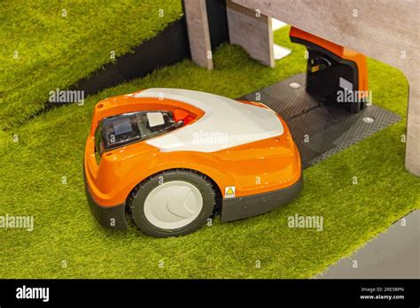 Automated Robot Lawn Mower Going To Docking Station Battery Charger