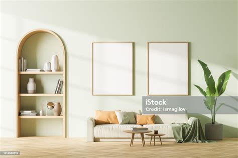 현대적인 인테리어 배경의 두 개의 모의 포스터 프레임 소파가있는 거실 책 선반 및 식물 3d 렌더링 0명에 대한 스톡 사진 및