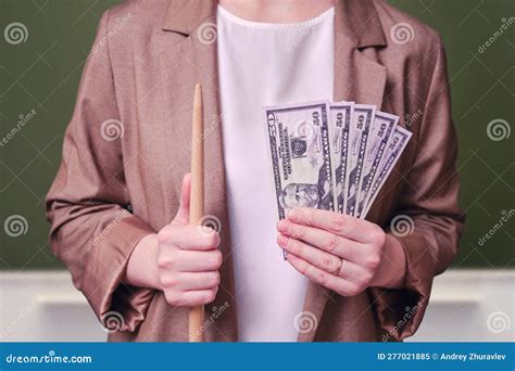 Woman Teacher Holding Money In Bills Of Dollars In Her Hands On A S Stock Image Image Of