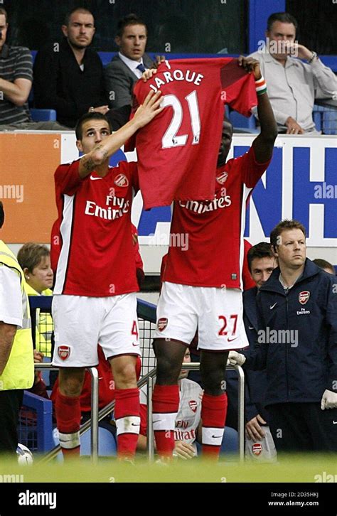 Arsenals Francesc Fabregas Left Celebrates Scoring His Sides Fifth