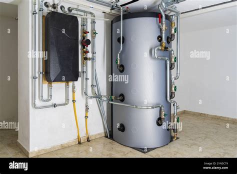 Modern Buffer Tank System Connected To Air To Water Heat Pump For