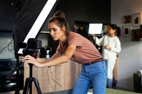 Premium Photo Two Female Women Checking Camera And Lights Before Recording