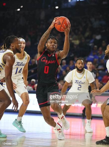 Houston Cougars Guard Marcus Sasser Makes A Move To The Paintduring A