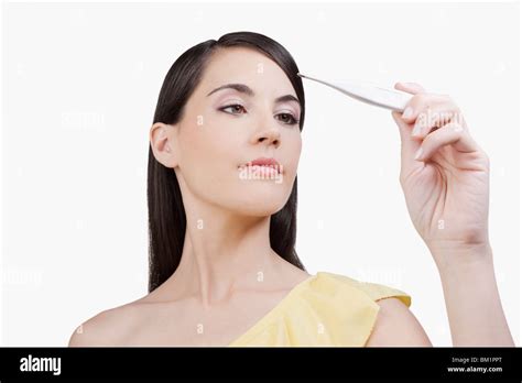 Woman Reading A Thermometer Stock Photo Alamy