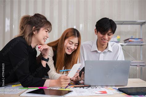 A Team Of Asian Designers Creates And Designs Ux Ui Brainstorming Software A Team Of Designers
