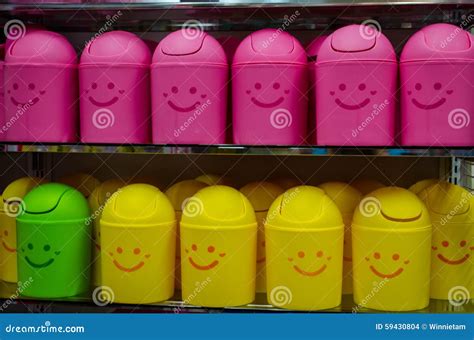 Garbage Bins With Colour Coded Lids For Recycling And Sorting Different Materials Stock Photo
