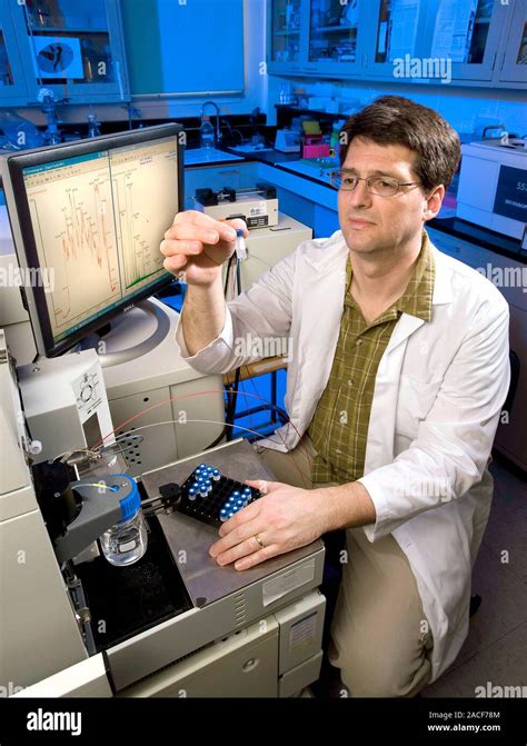Tandem Mass Spectrometry Molecular Biologist Analysing Results From A