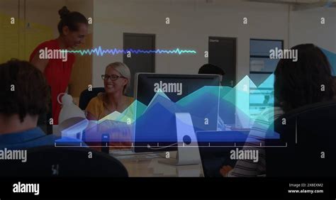 Image Of Graphs And Soundwaves Over Caucasian Colleagues Using Computer