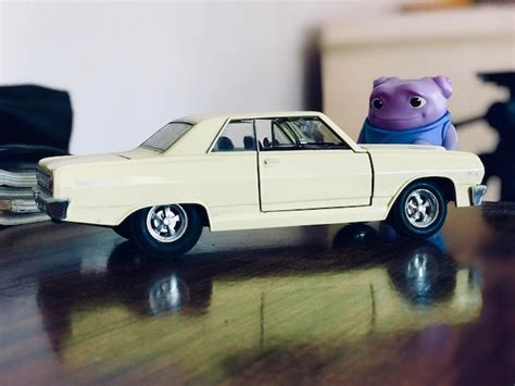 Premium Photo Close Up Of Toy Car On Table