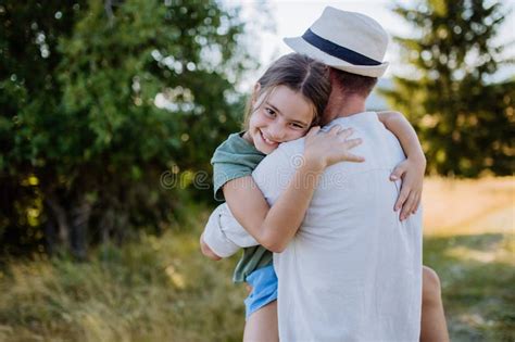 Father Hugging His Daughter In Summer In Nature Father S Day Concept