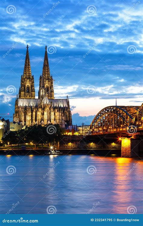 Cologne Cathedral City Skyline And Hohenzollern Bridge With Rhine River