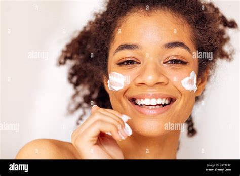 Close Up Beauty Portrait Of Laughing African With Wavy Hair And