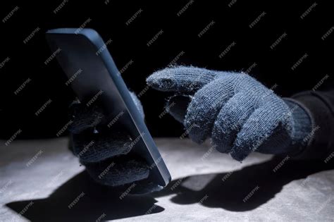 Premium Photo Hacker Hand Hacking Mobile Phone Security Cyber Security Concept