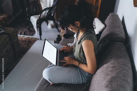 Babe Female Sitting Front Open Laptop Computer With Blank Mock Up Screen For Paste Advertising