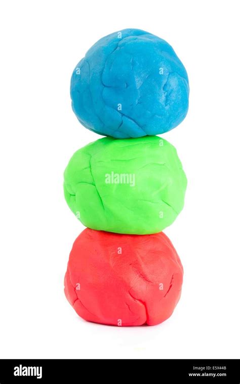 A Stack Of Blue Green And Red Balls Of Play Doh Modeling Clay Over